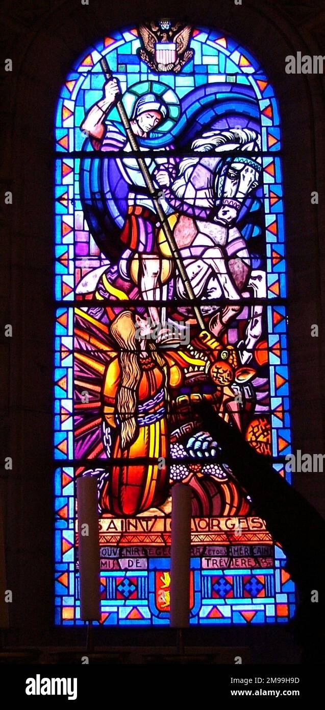 This is one of two stained glass windows in the church at Trevieres ...