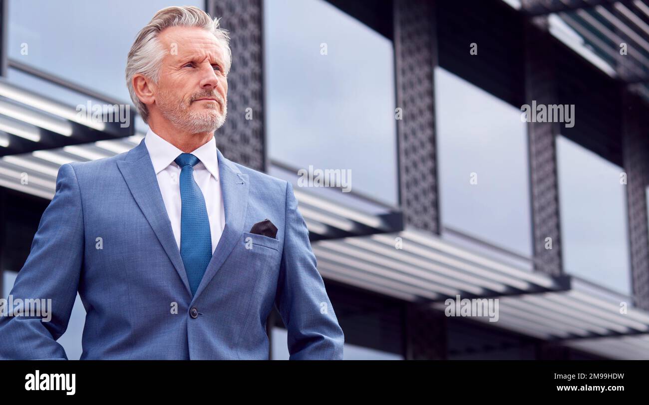 Portrait Of Serious Senior Businessman CEO Chairman Standing Outside ...