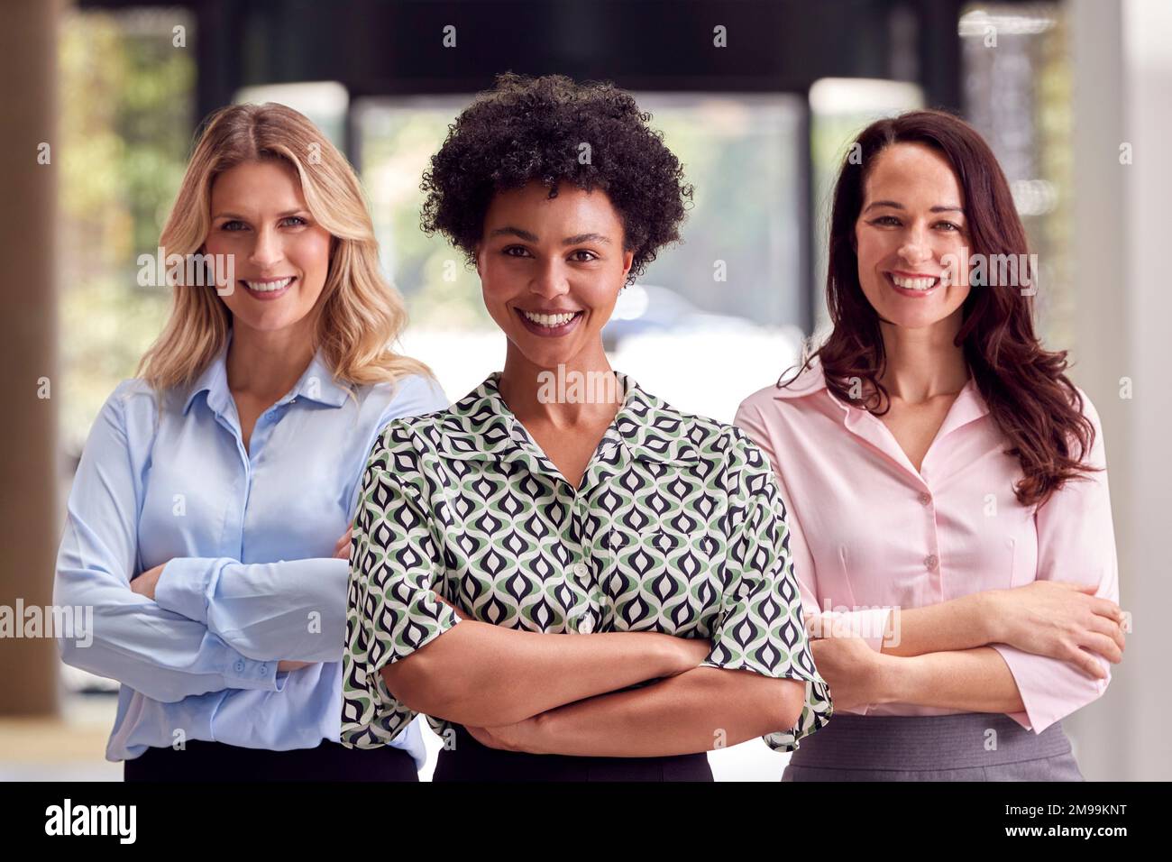 Portrait Of Multi-Cultural Female Business Team Inside Modern Office ...