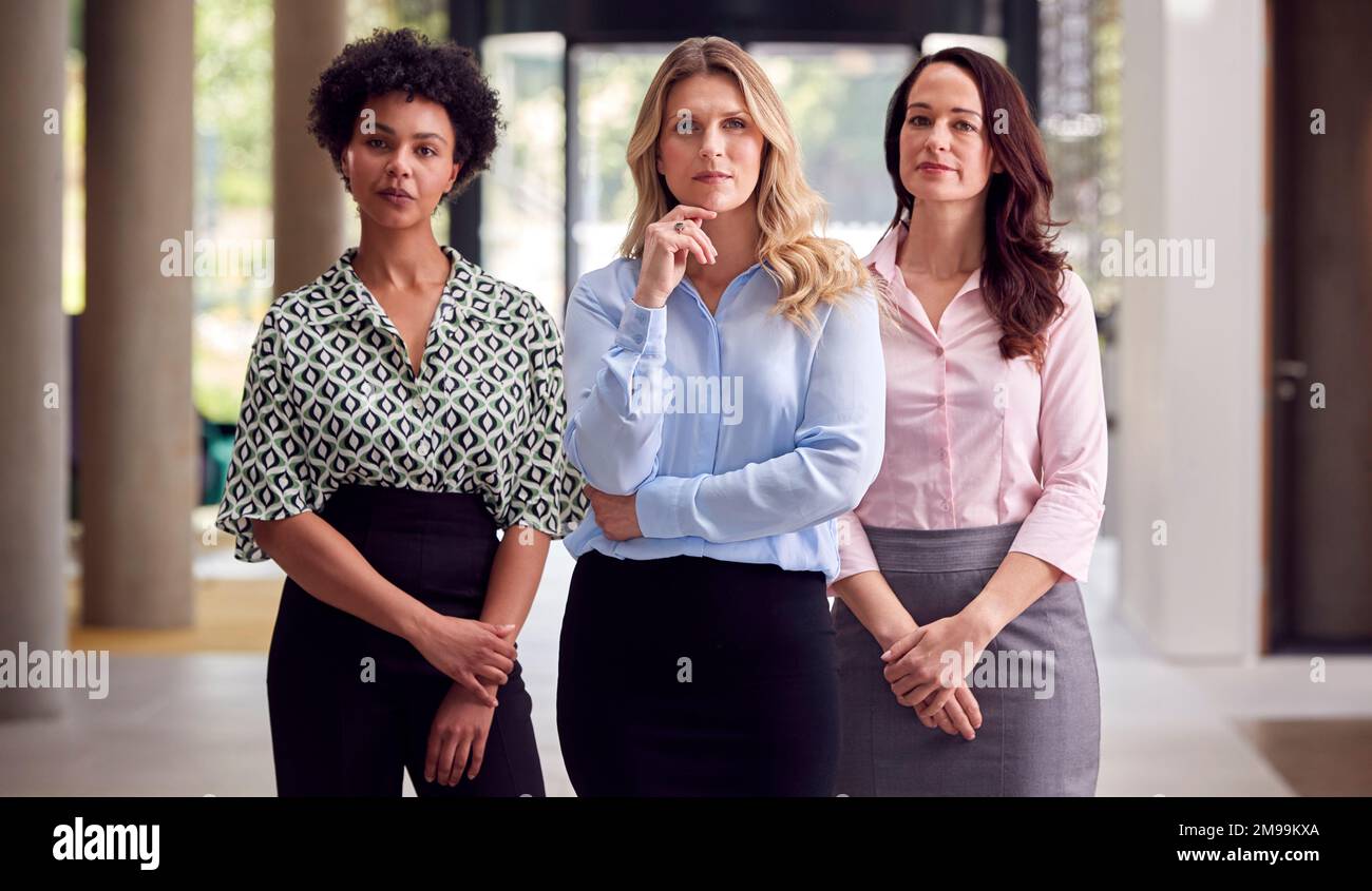 Portrait Of Multi-Cultural Female Business Team Inside Modern Office ...