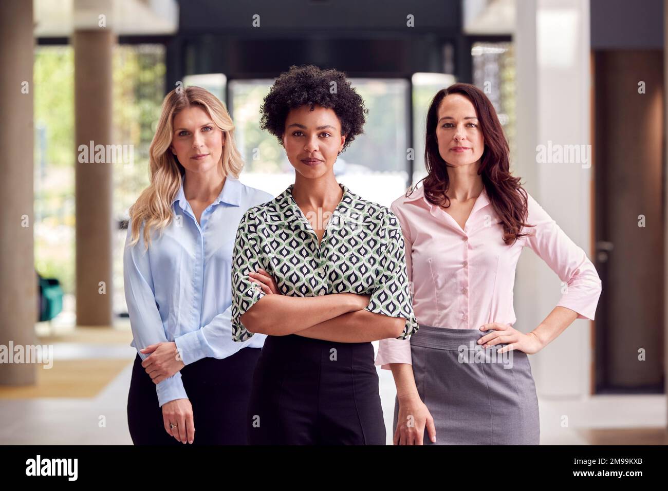 Portrait Of Multi-Cultural Female Business Team Inside Modern Office ...