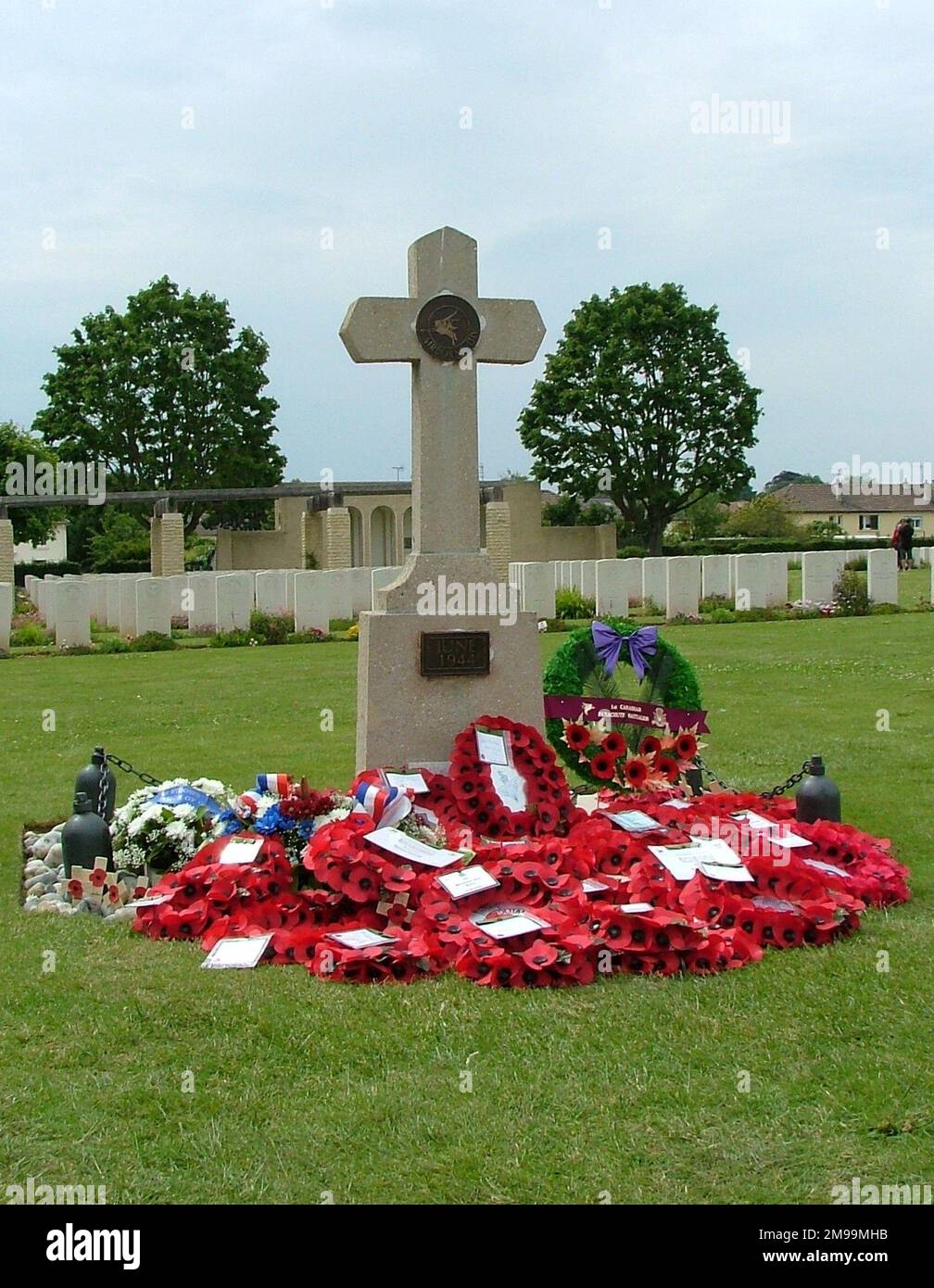 This stone cross is roughly in the centre of the Cemetery and has a ...