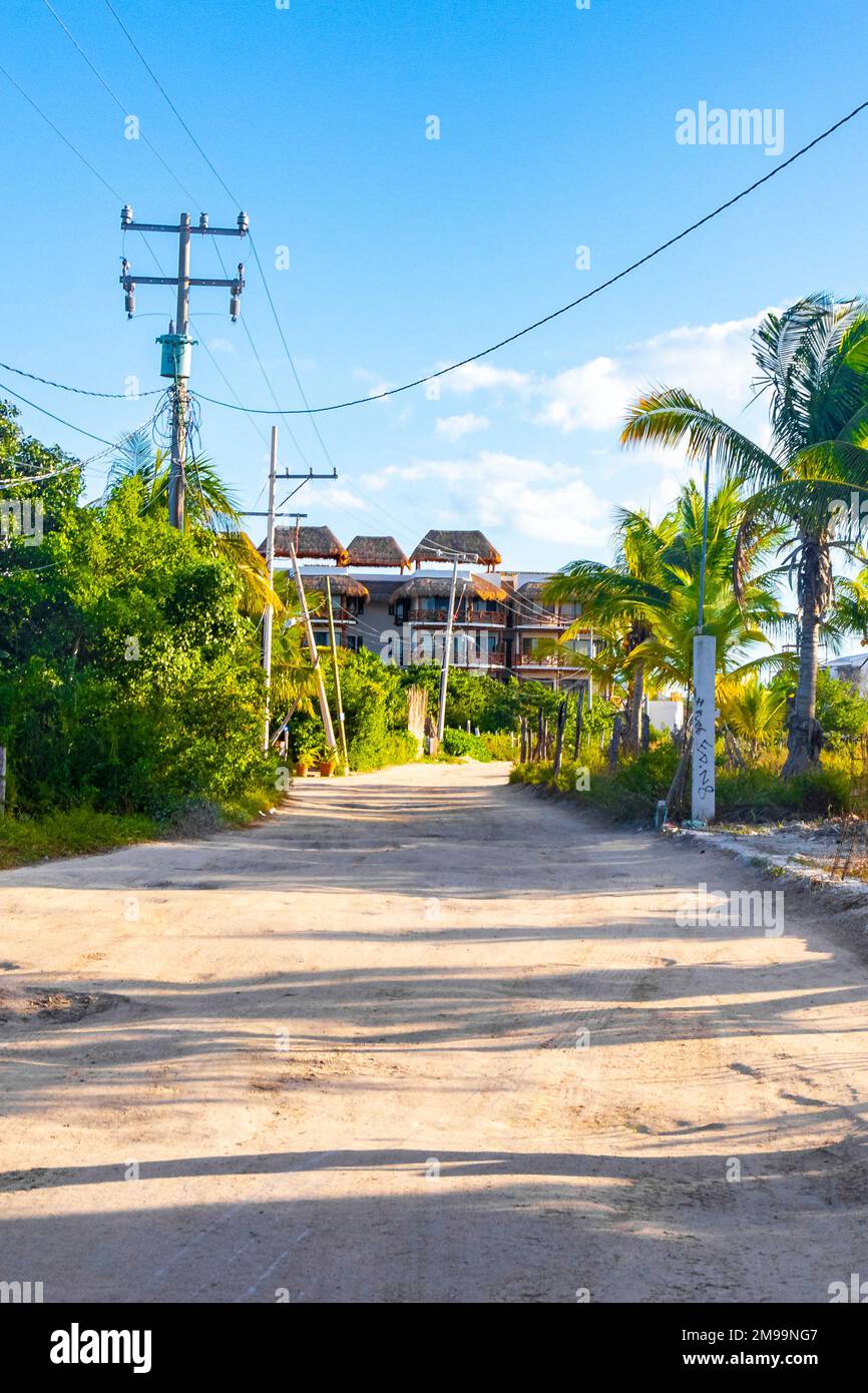 Sandy muddy road walking path and landscape view with tropical nature ...