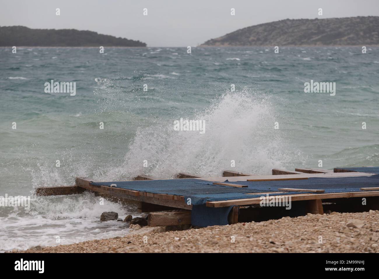 A strong south wind raises big waves along the coast of Brodarica and ...