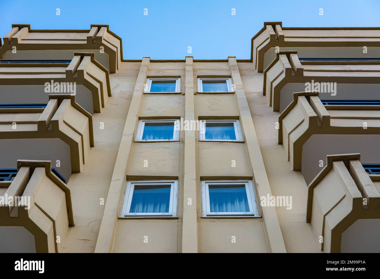 Photo of a multi-storey building during the day in Turkey. Symmetry of ...