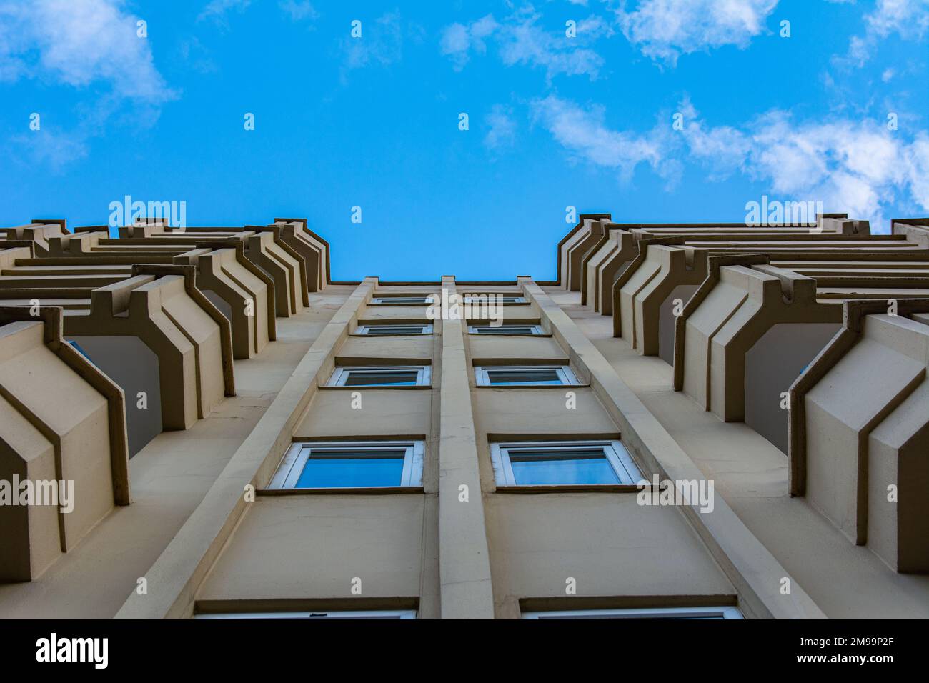 Photo of a multi-storey building during the day in Turkey. Symmetry of ...