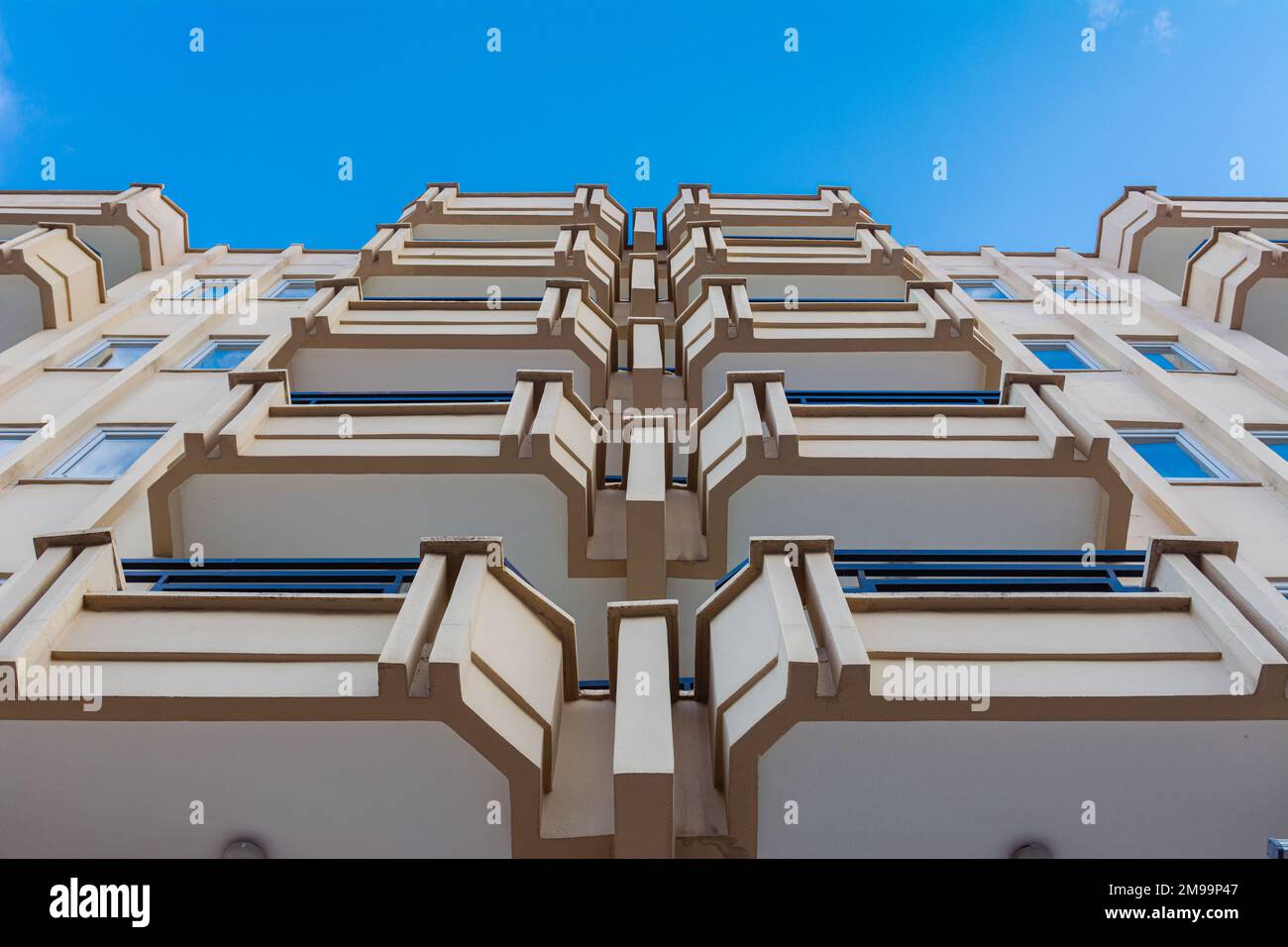 Photo of a multi-storey building during the day in Turkey. Symmetry of ...