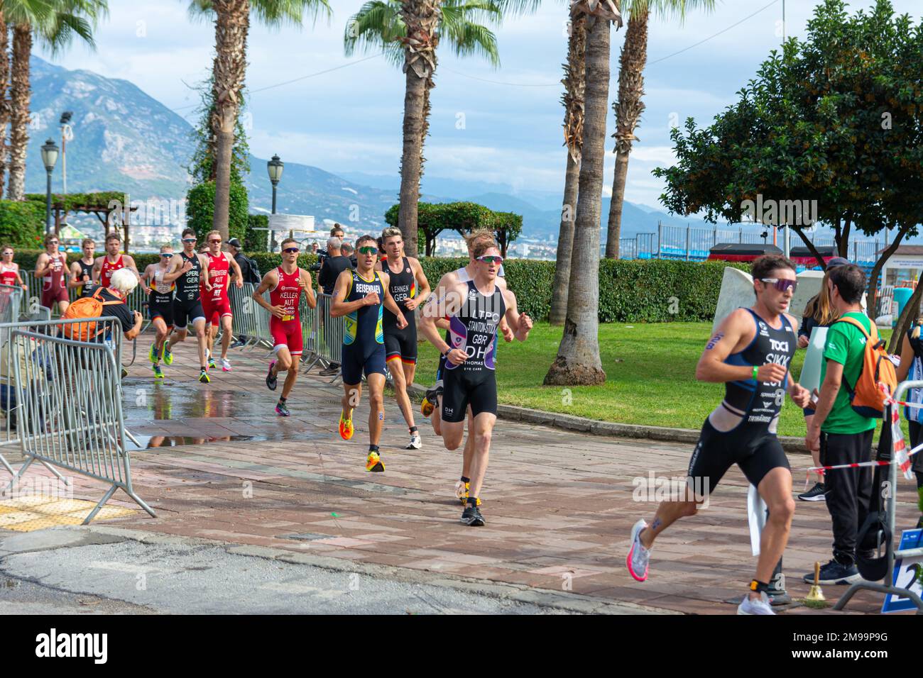 Alanya, Turkey, 16.10.2022: Man athletes from different countries run a ...
