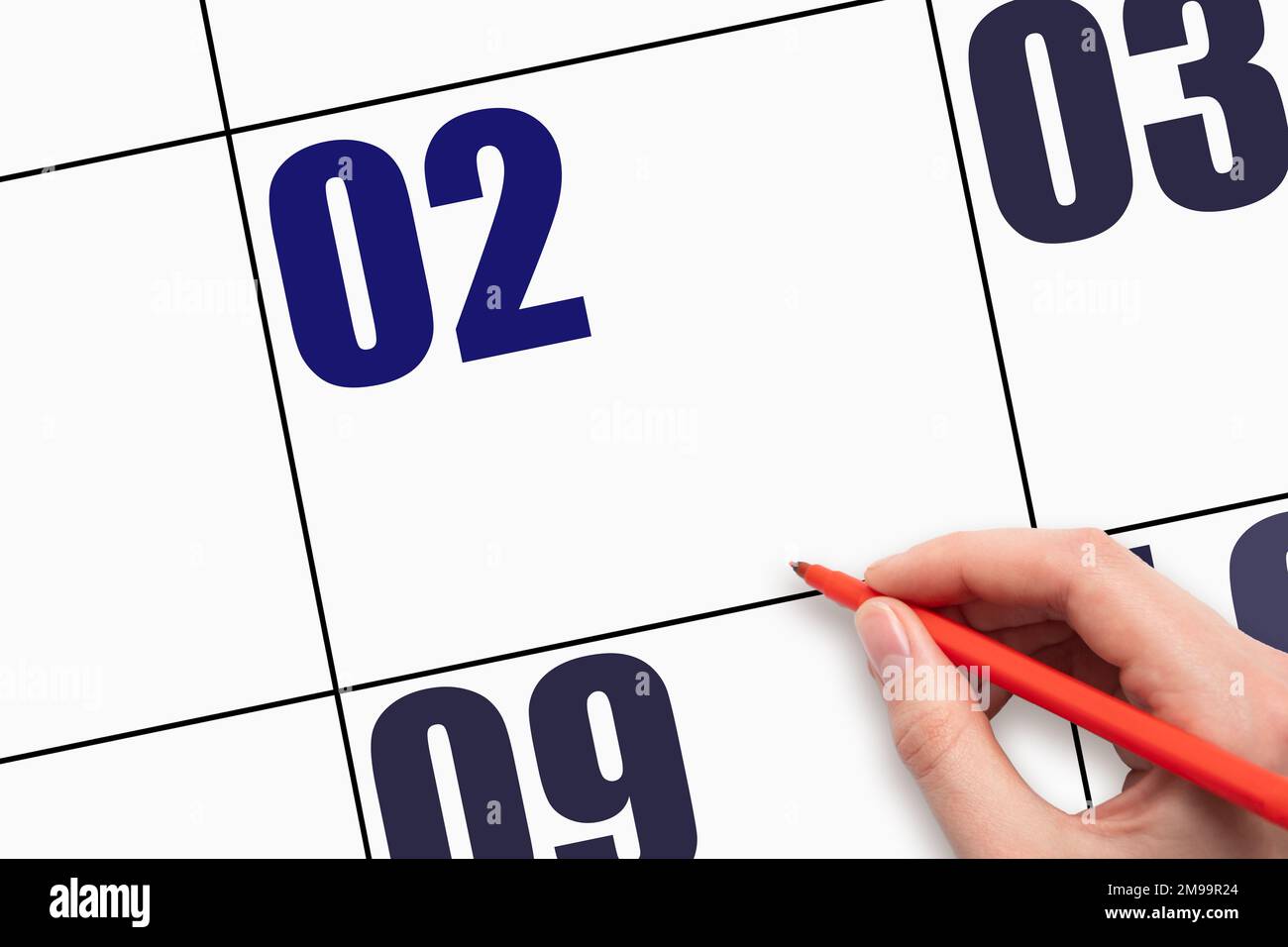 2nd day of the month. Hand holding the red pen points to an empty ...