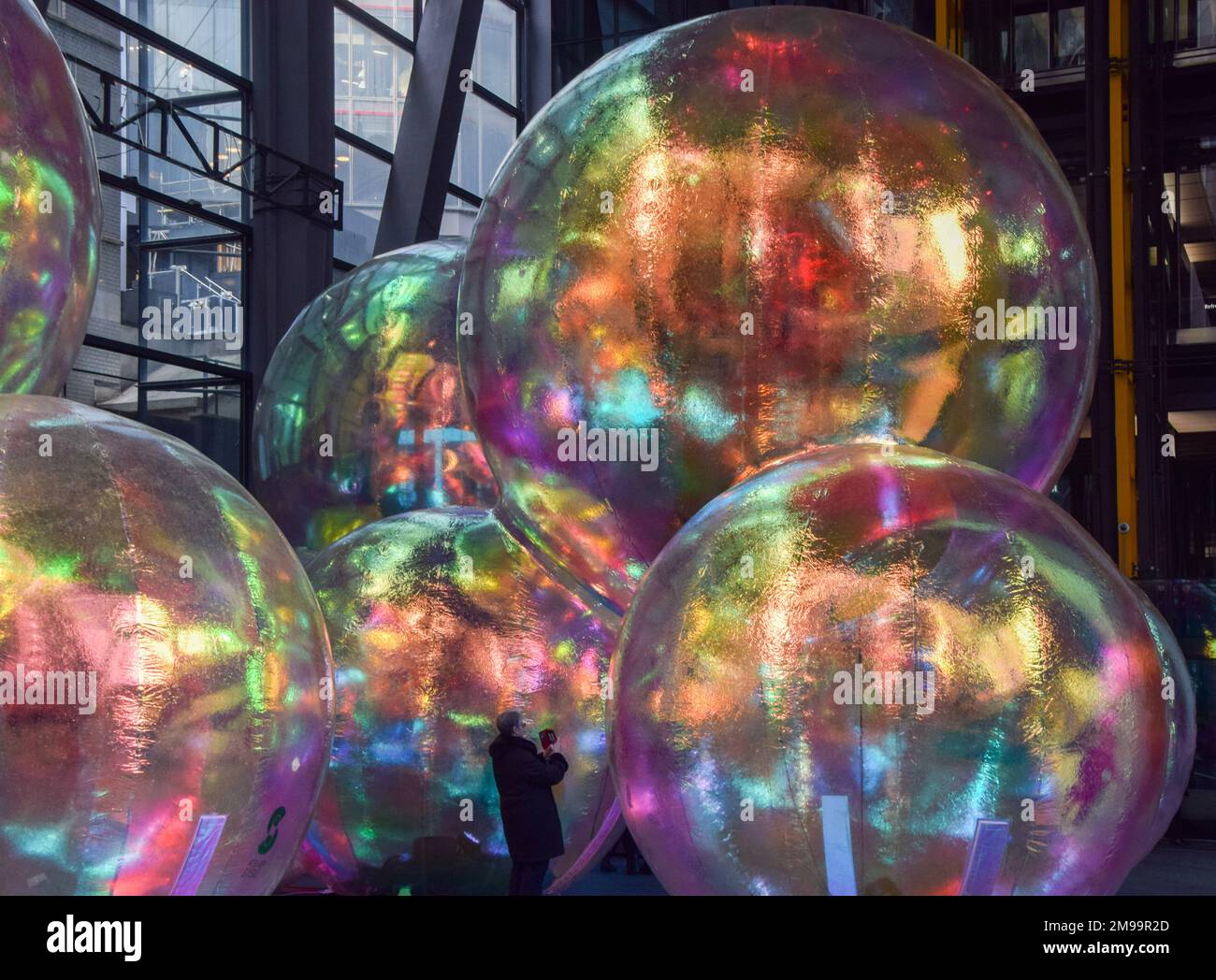 London, England, UK. 17th Jan, 2023. A visitor takes photos of the ...