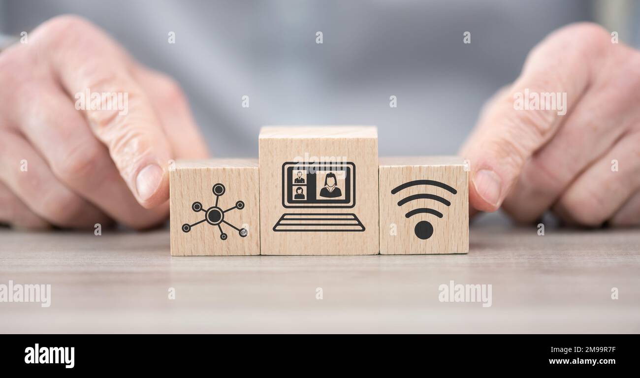 Wooden blocks with symbol of online meeting concept Stock Photo - Alamy
