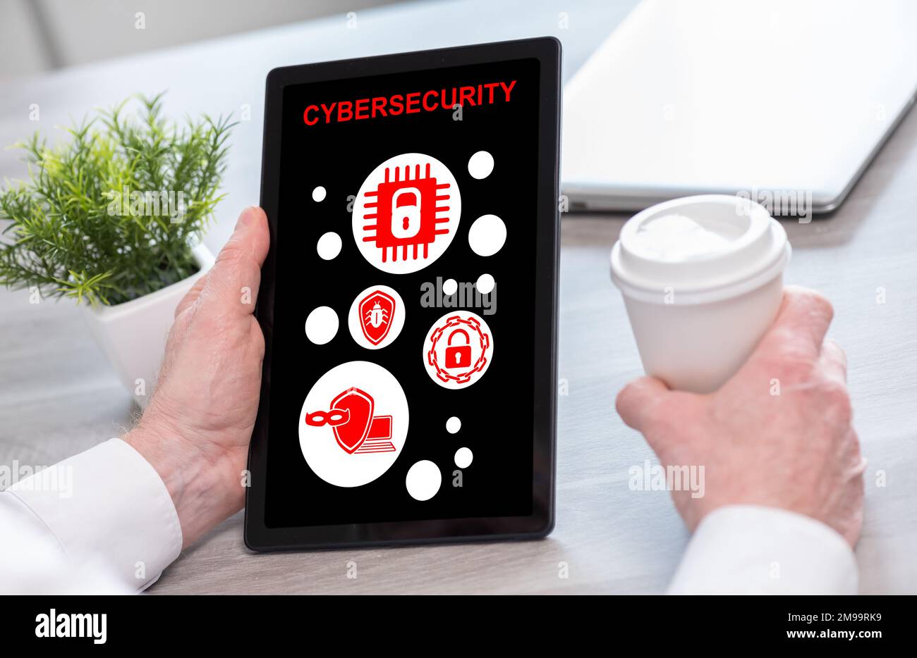 Tablet screen displaying a cybersecurity concept Stock Photo - Alamy