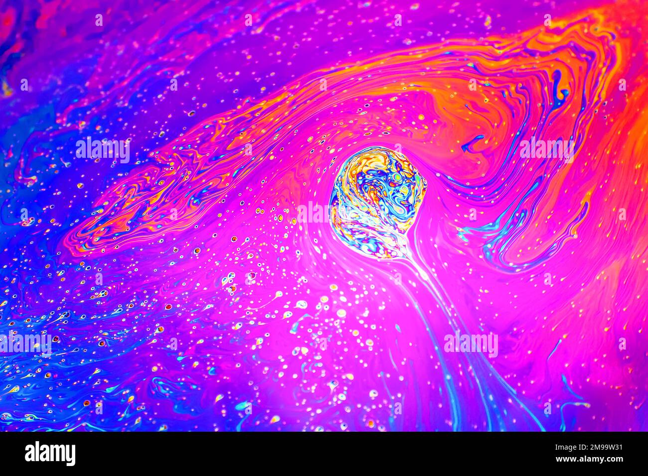 Amazing inflorescent colors are created by the light on a soap bubble ...