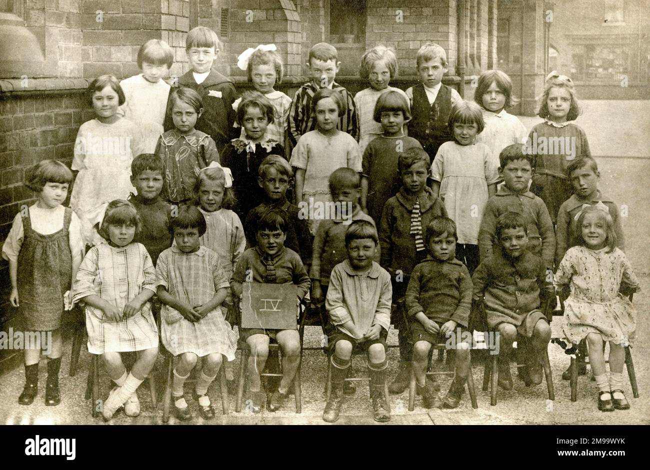 School photograph of the girls and boys of Class IV Stock Photo - Alamy