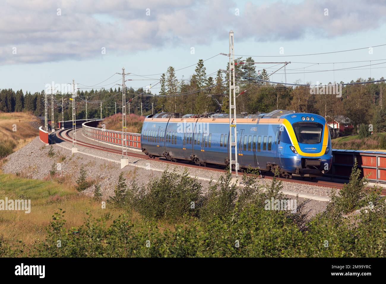 BOTHNIA LINE, SWEDEN ON AUGUST 13, 2014. Norrtag is on the track. High ...