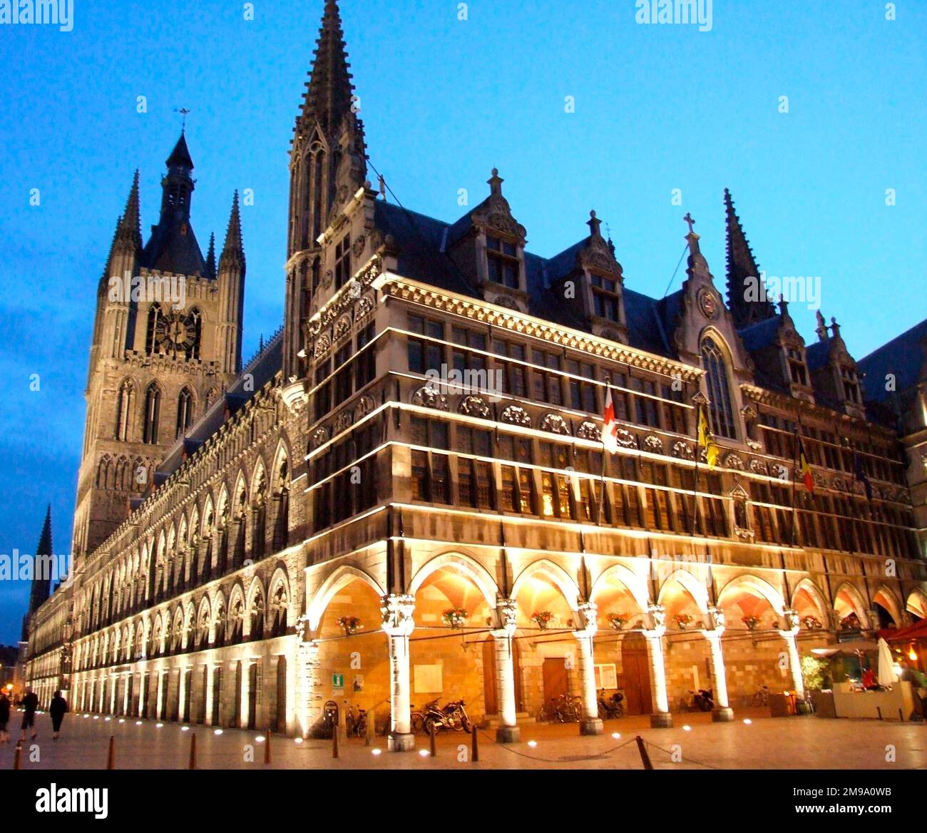 The re-built Ypres Cloth Hall at night Stock Photo - Alamy
