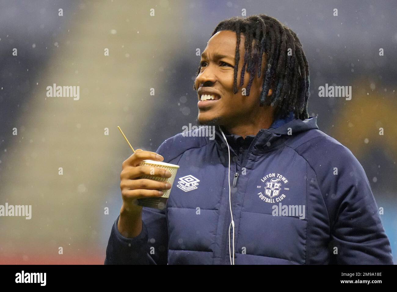 Gabriel Osho #32 of Luton Town inspects the pitch before the Emirates ...