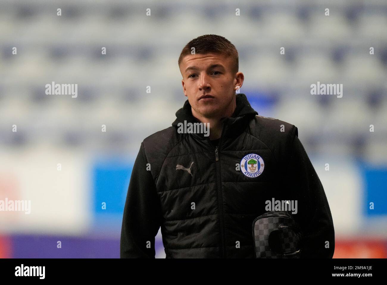 Charlie Hughes #32 of Wigan Athletic arrives at the stadium before the ...