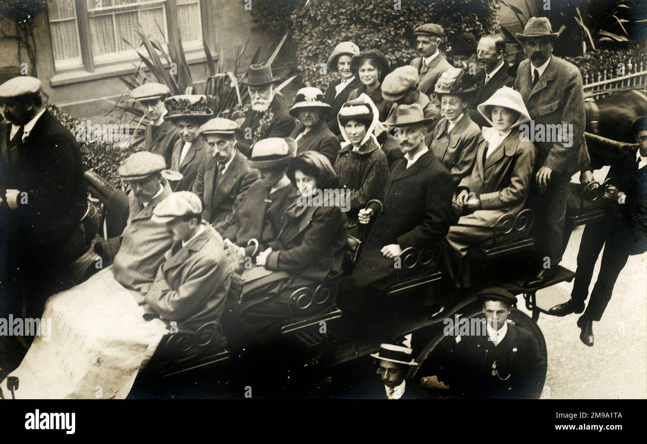 Visitors/Holidaymakers (wrapped-up warm!) head off on a British ...