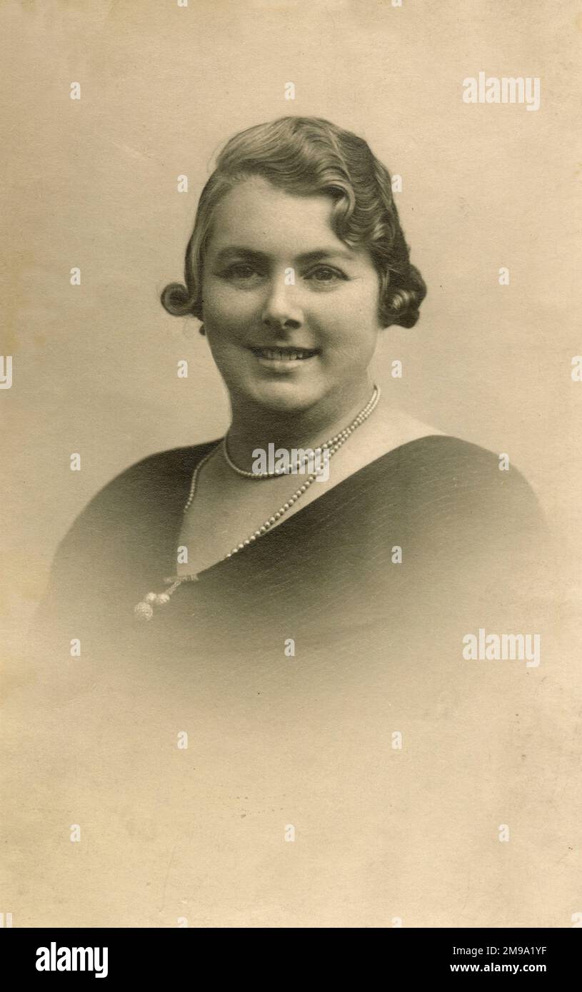 Studio portrait of a smiling woman from Hull - May, 1936 Stock Photo ...