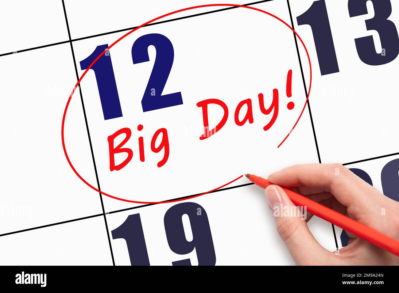 12th day of the month. Hand writing text BIG DAY and circling the ...