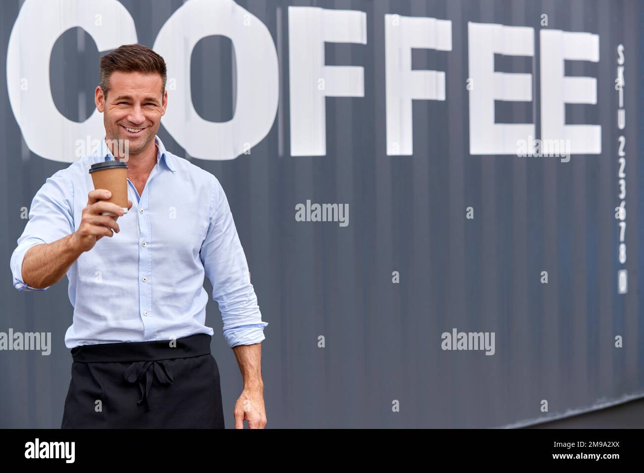 Portrait Of Male Owner Of Coffee Shop Or Distribution Business Standing ...