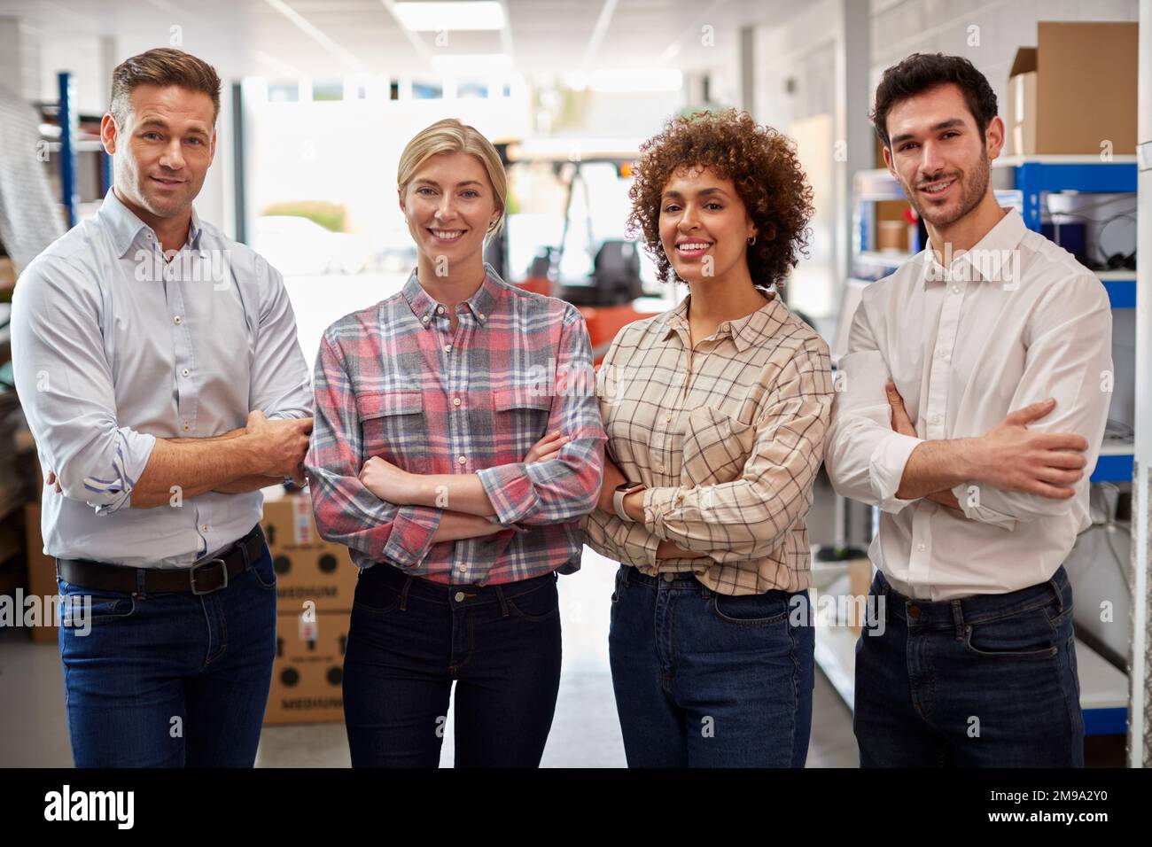 Portrait Of Management Team In Logistics Distribution Warehouse Stock ...