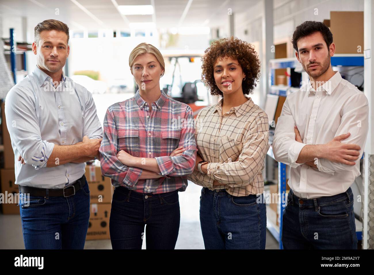 Portrait Of Management Team In Logistics Distribution Warehouse Stock ...
