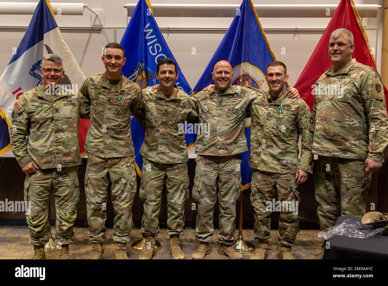 Spc. Nathanial Miska and Sgt. Richard Carlson along with their sponsers ...