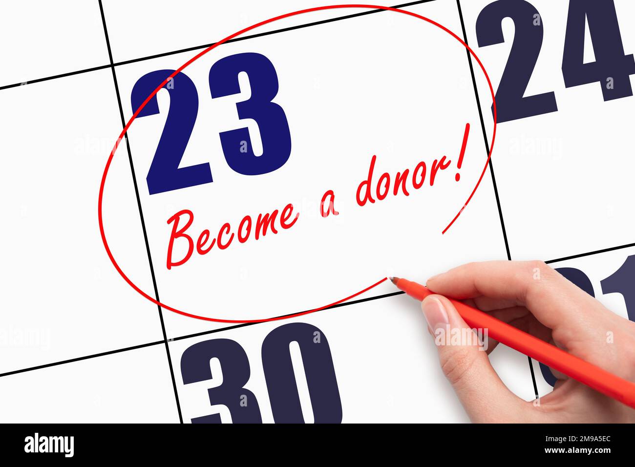 23rd day of the month. Hand writing text BECOME A DONOR and circling ...