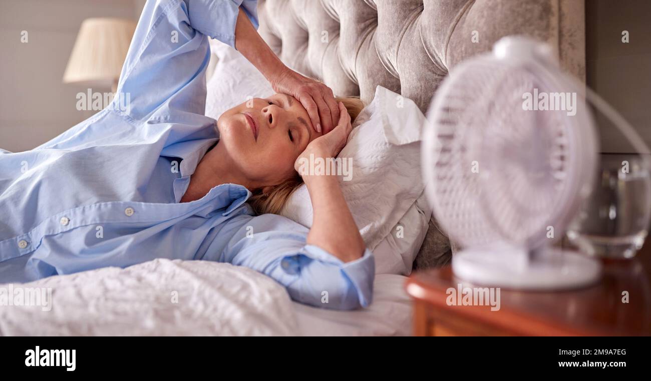 Electric fan woman mature hi-res stock photography and images - Alamy