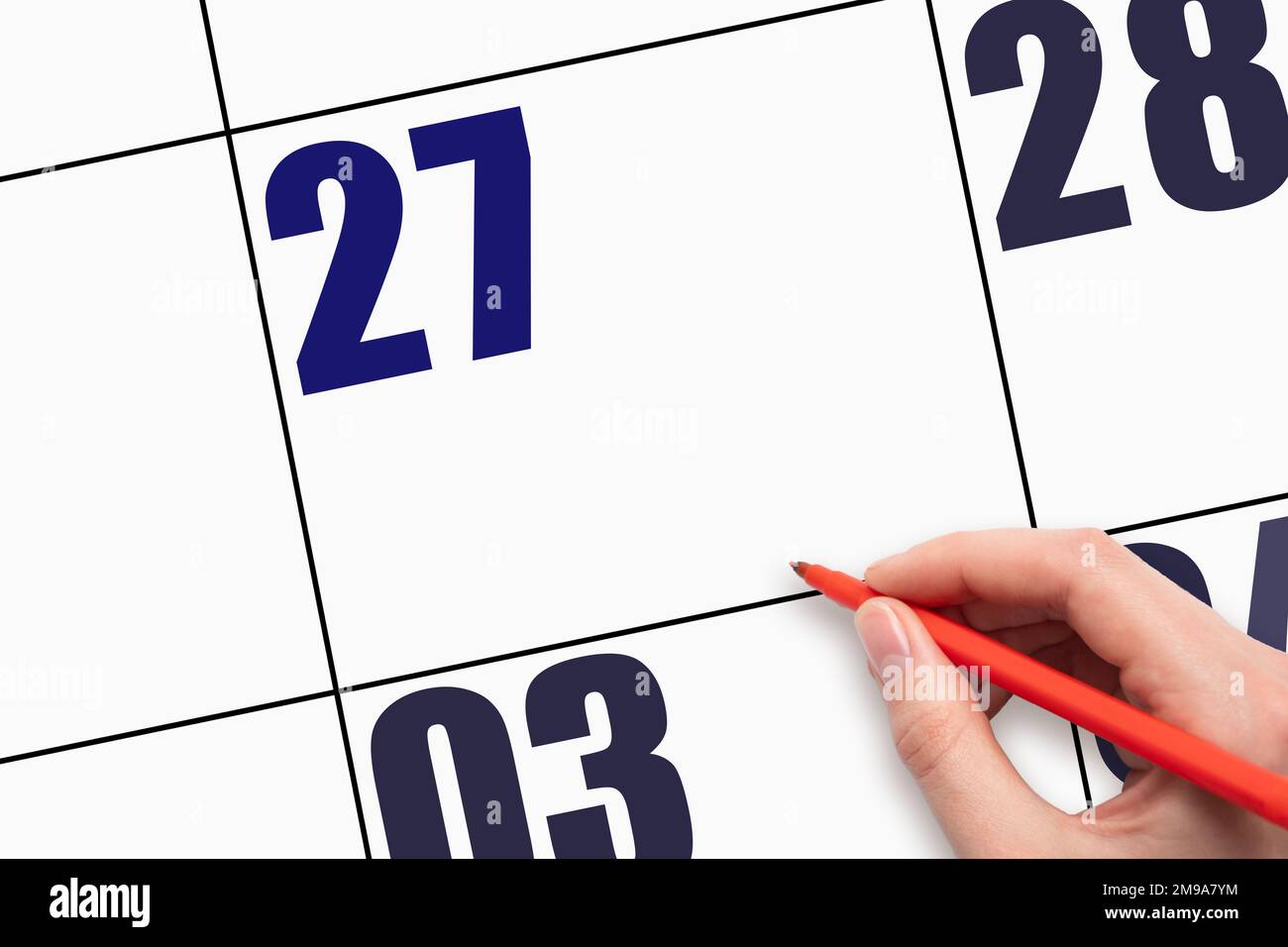 27th day of the month. Hand holding the red pen points to an empty ...