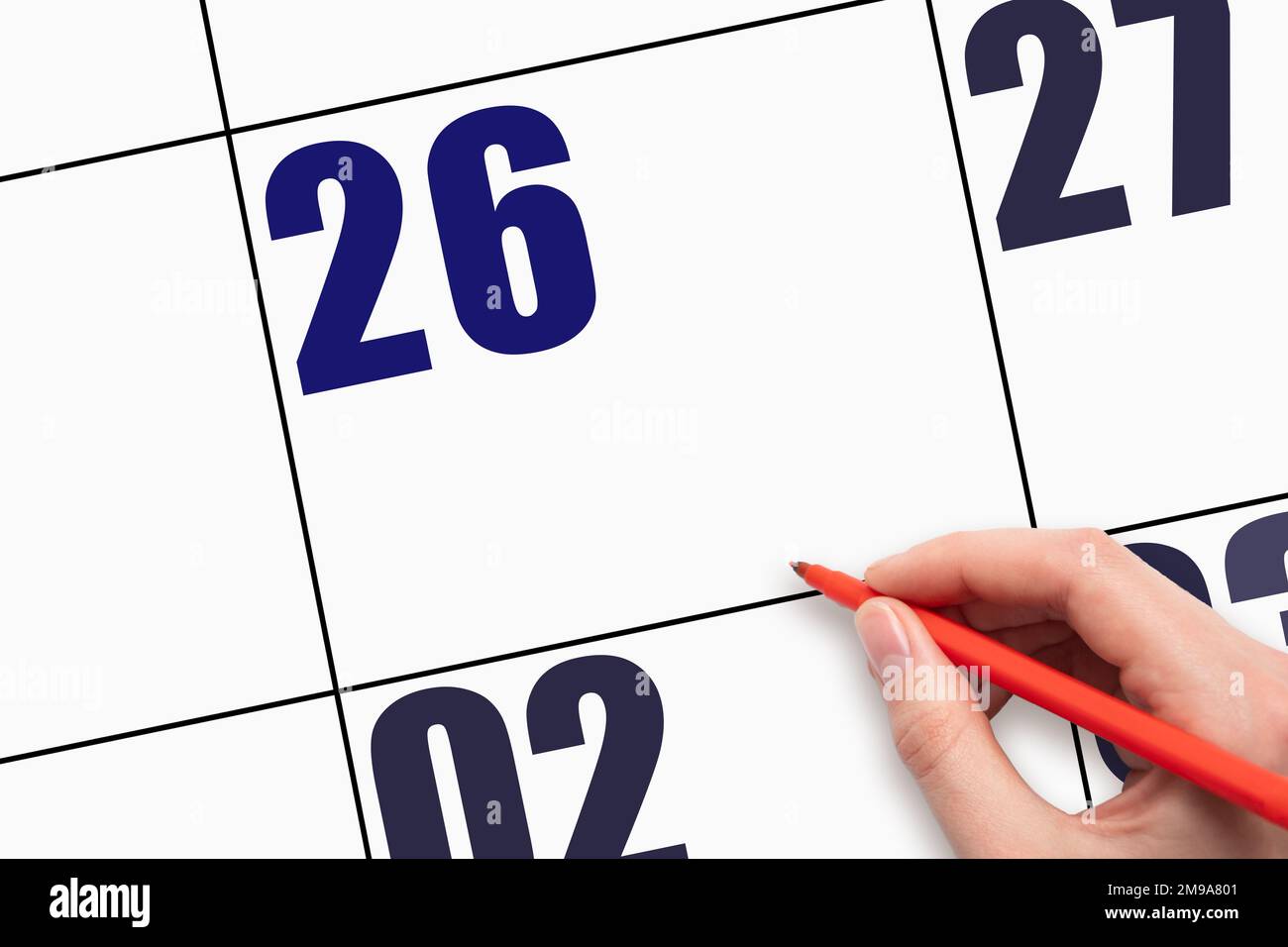 26th day of the month. Hand holding the red pen points to an empty ...