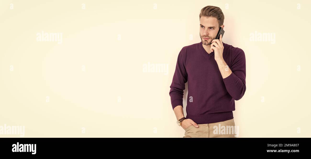Hello. Handsome man talk on phone. Mobile technology. Phone ...