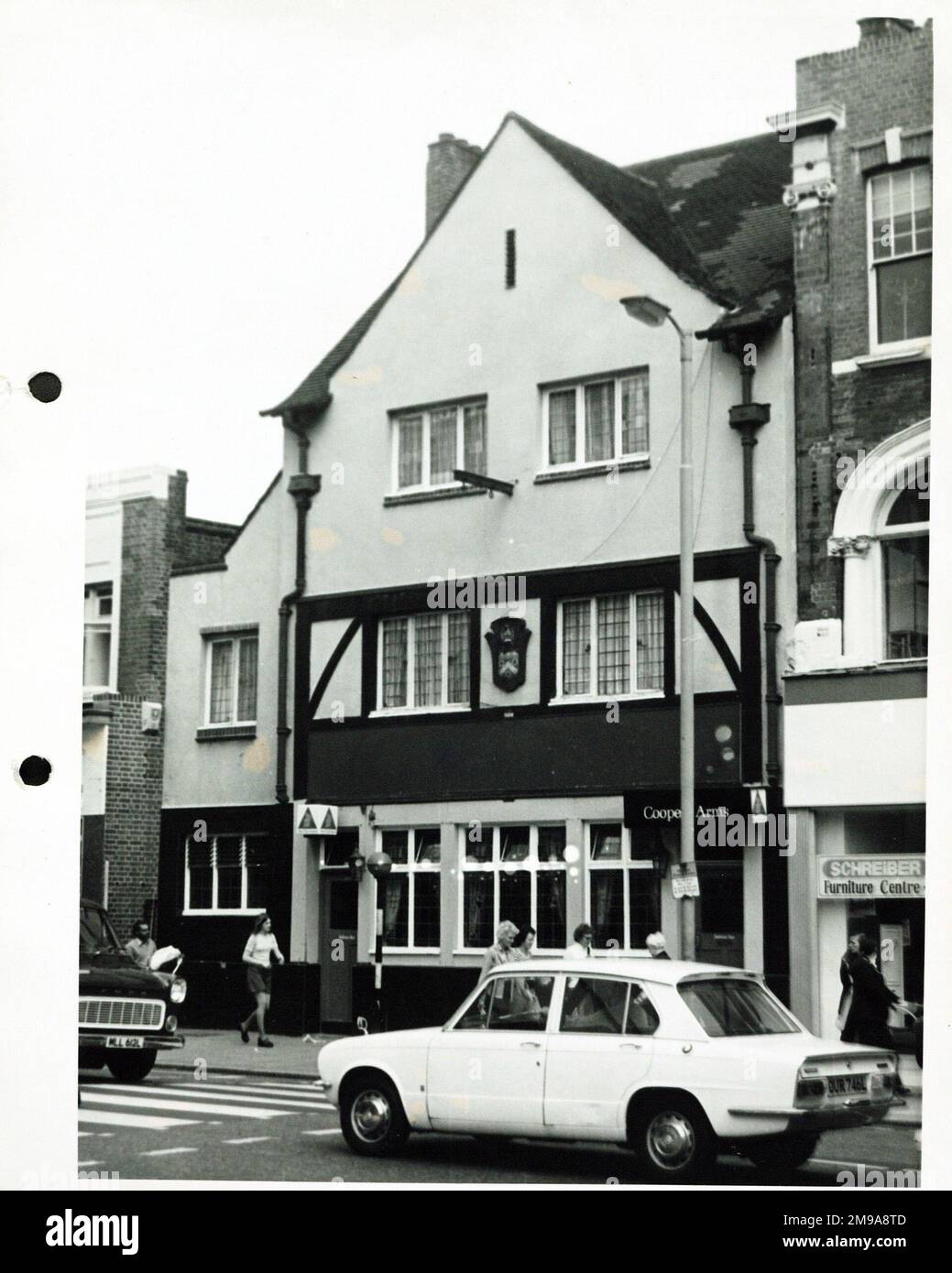 Photograph of Coopers Arms, Kilburn, London. The main side of the print ...