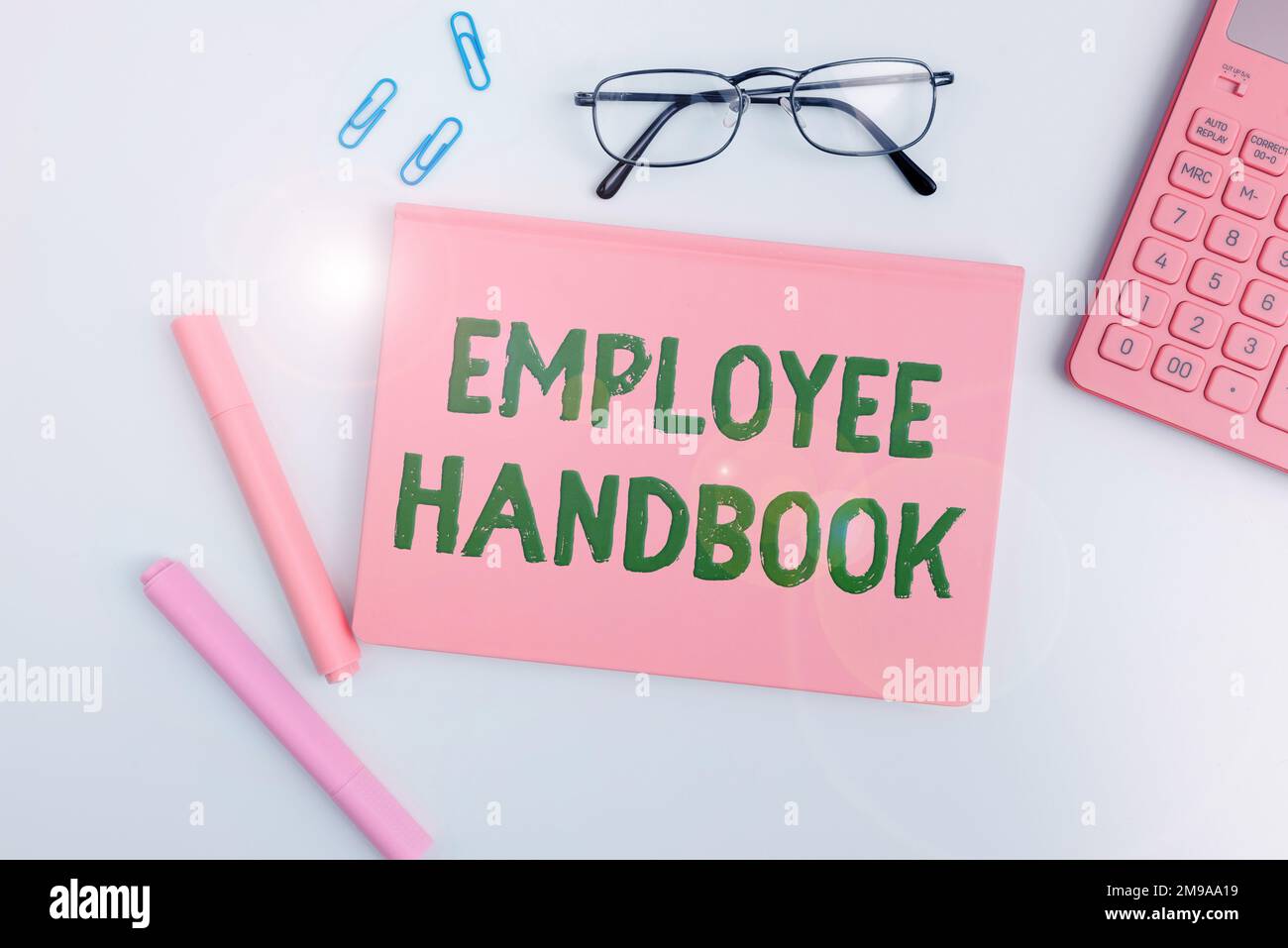 Hand writing sign Employee Handbook. Business showcase Document that ...