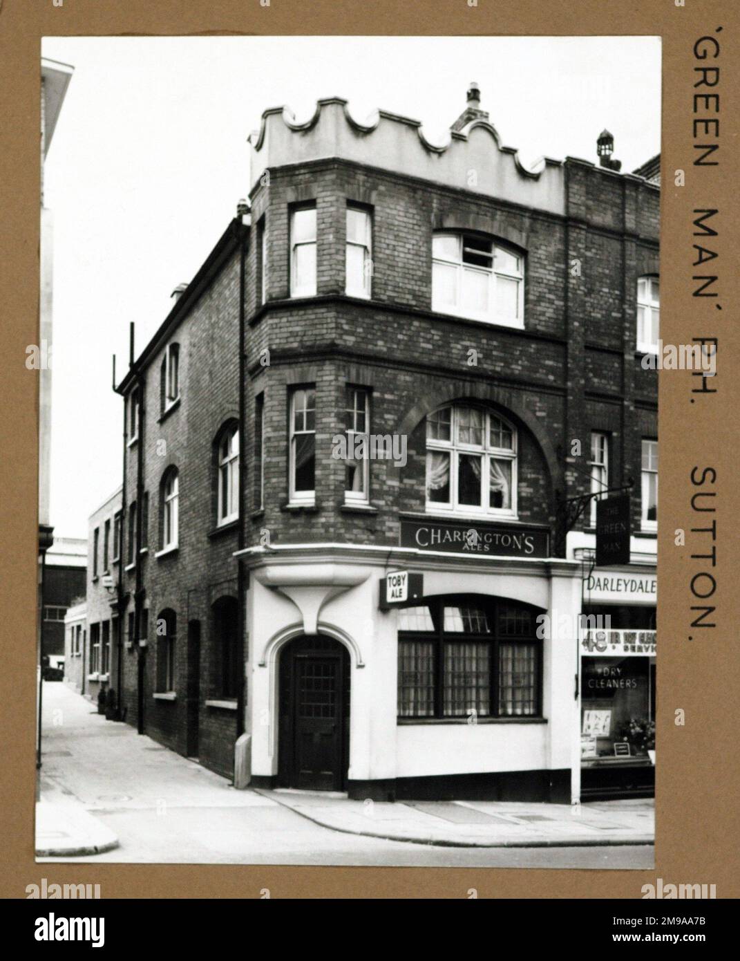 Photograph of Green Man PH, Sutton, Surrey. The main side of the print (shown here) depicts ...