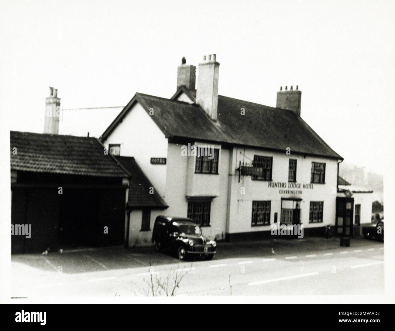 Photograph of Hunters Lodge PH, Axminster, Somerset. The main side of ...