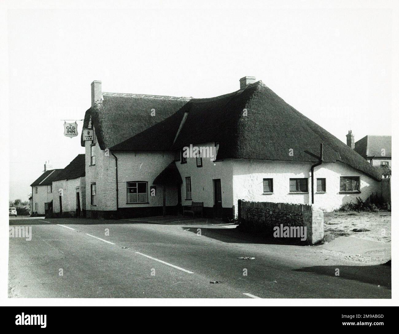 Photograph of Old Inn, Axminster, Somerset. The main side of the print ...