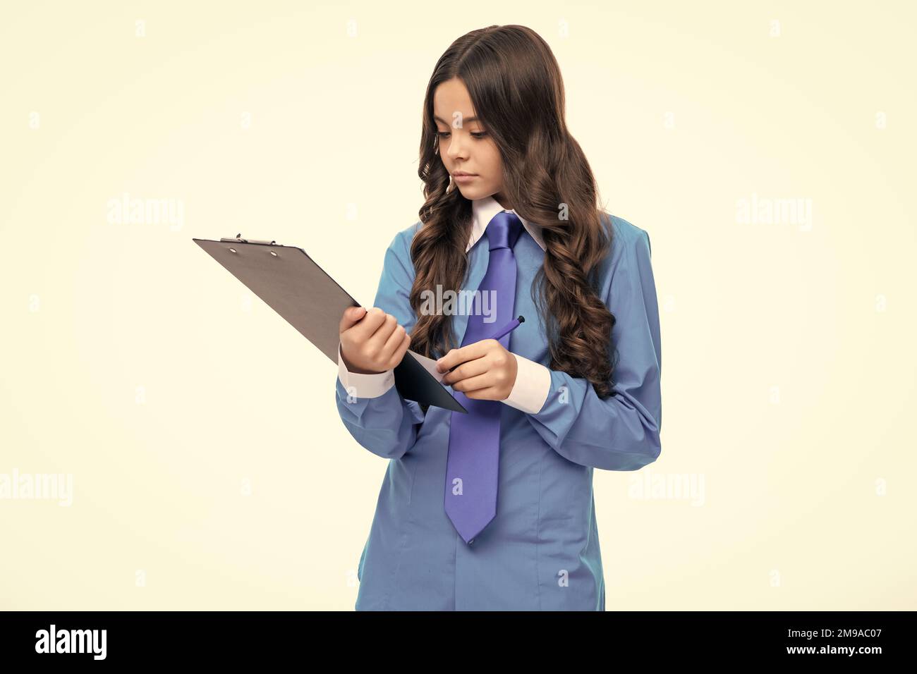 Teenage girl looking at job list on clipboard on white background Stock ...