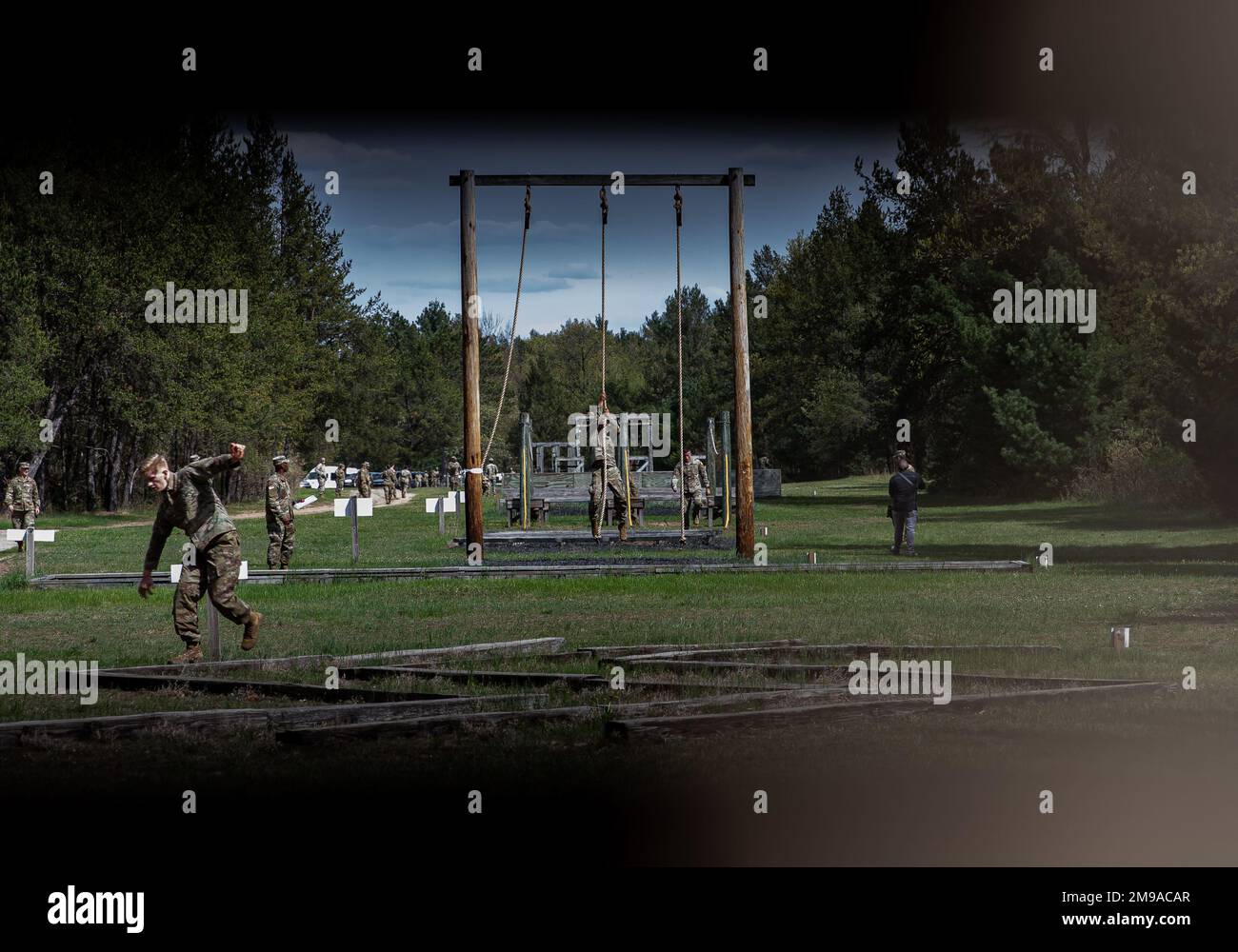 Army Reserve competitors tackle several physical obstacle during the ...