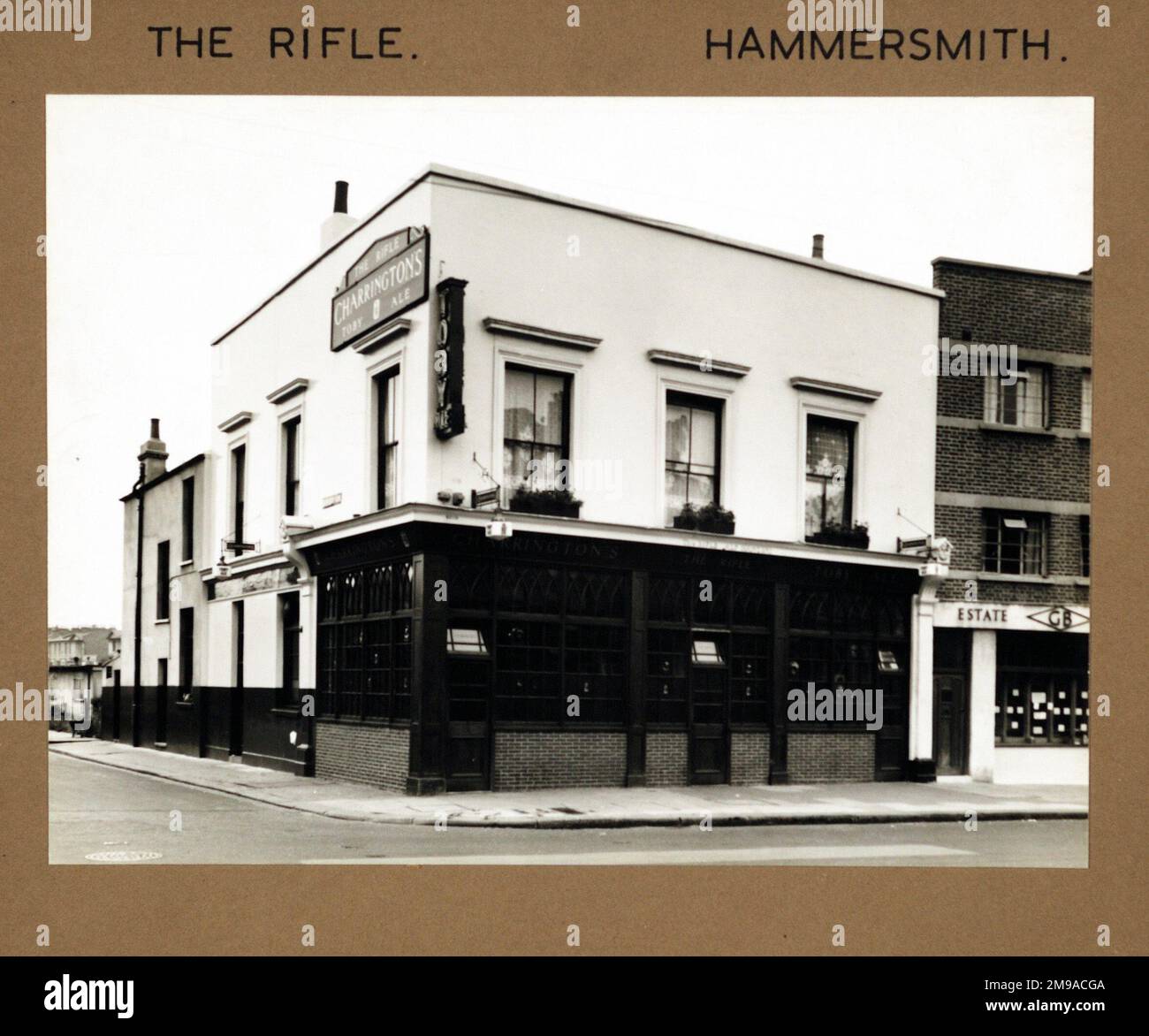 Photograph of Rifle PH, Hammersmith, London. The main side of the print ...