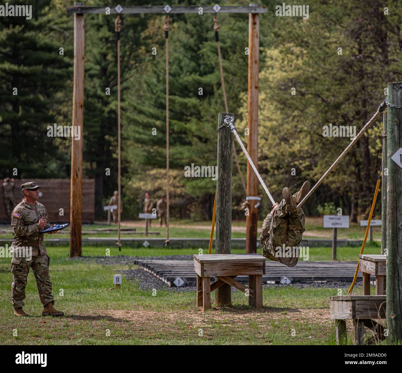 Army Reserve competitors tackle several physical obstacle during the ...