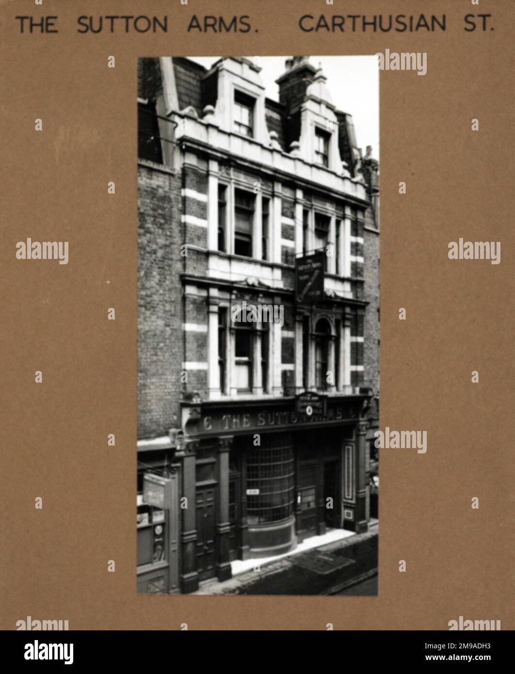 Photograph of Sutton Arms, Aldersgate, London. The main side of the ...