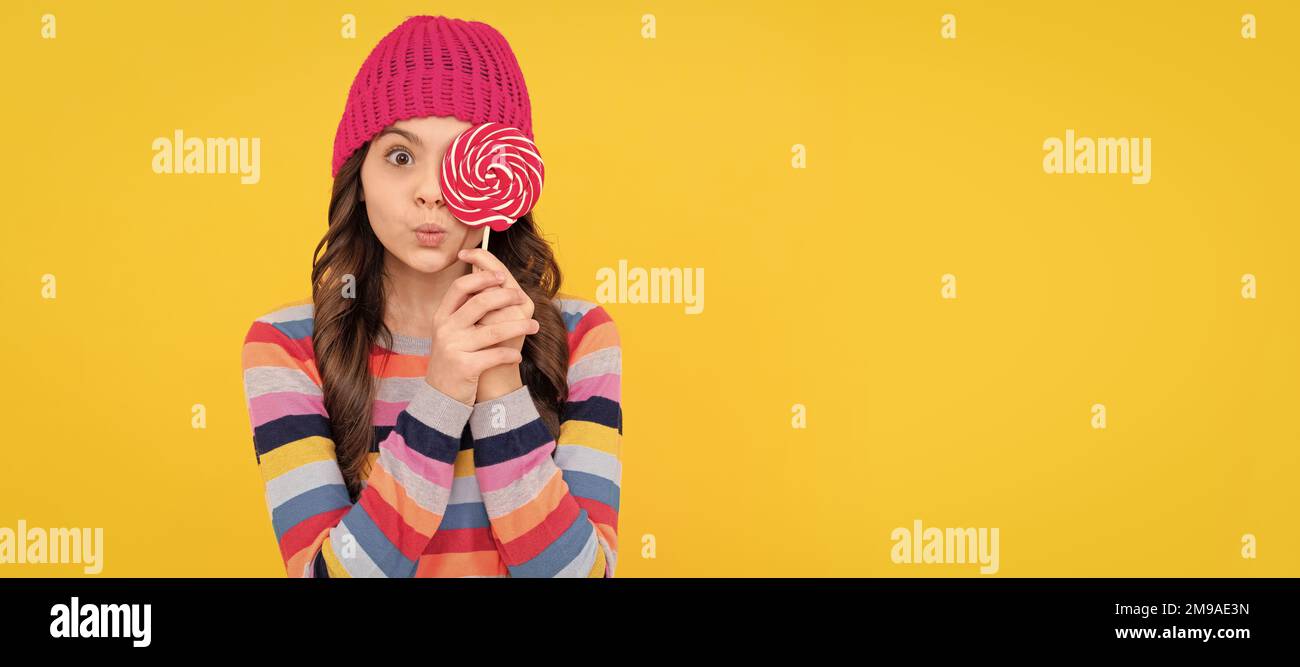 surprised teen girl hold lollipop. lollipop lady. hipster kid with ...