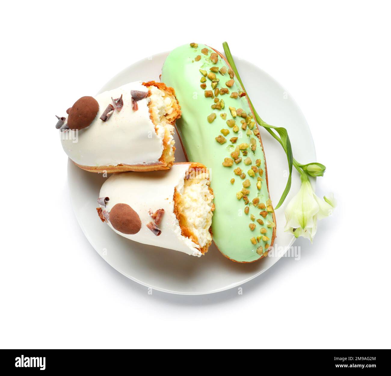 Plate with delicious eclairs isolated on white background Stock Photo ...