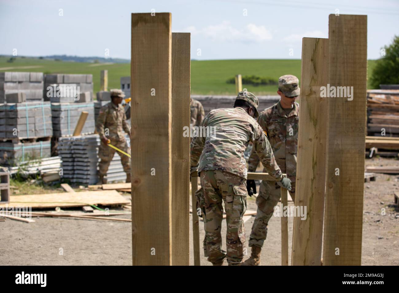 U.S. Army Spc. Jamir Johnson (left), assigned to 601st Engineer ...