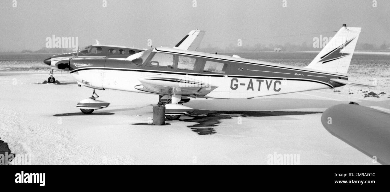 Piper PA-32 Cherokee Six G-ATVC, snowbound at Southend Airport Stock ...