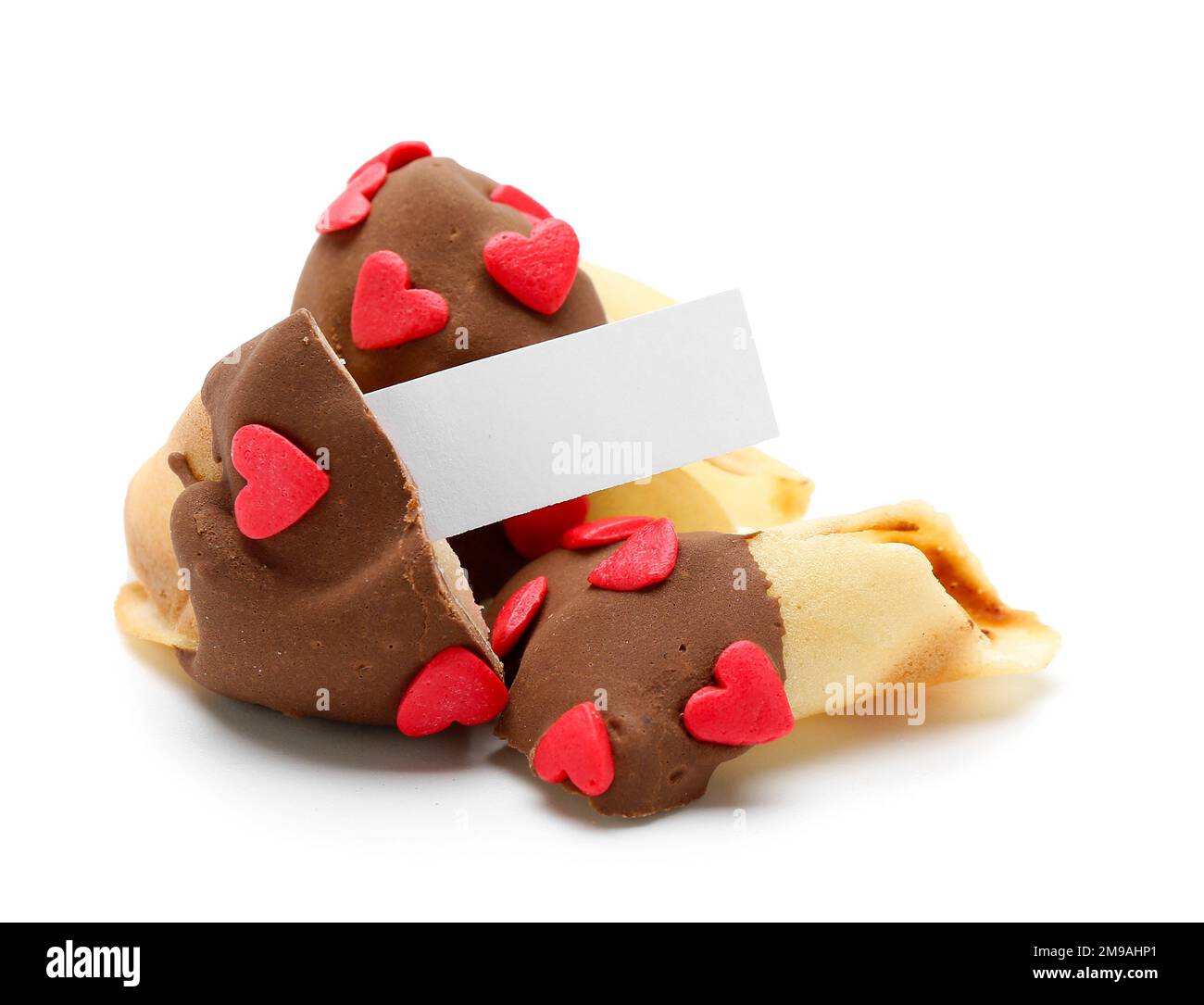 Tasty fortune cookies with piece of paper isolated on white background ...