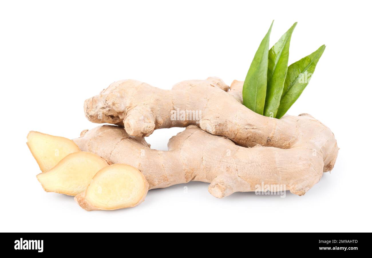 Fresh ginger roots and leaves on white background Stock Photo - Alamy